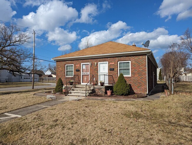 Charming Brick Duplex: Cozy Living, Modern... - 1703 E 33rd St Lorain ...