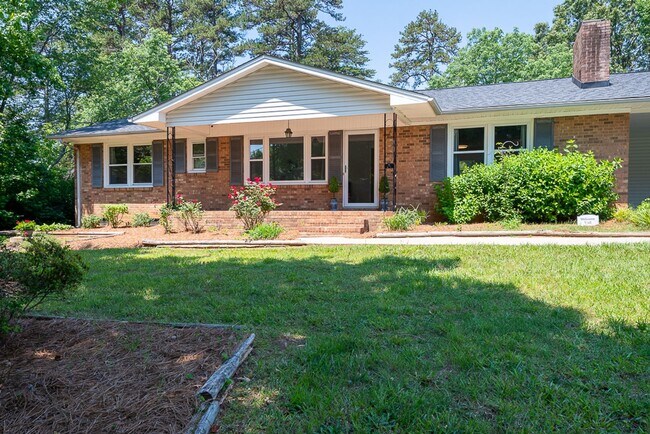 Classic brick rancher with carport - 320 Broken Saddle Ln Kernersville ...