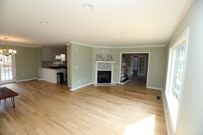 This distinguished five-bedroom, three-bathroom residence offers an ...