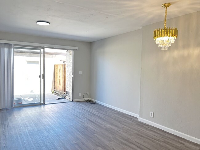 Move-in ready Evergreen townhome with private backyard, detached 2-car ...