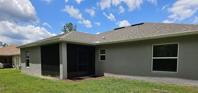 BEAUTIFUL 4/2 HOME IN PALM COAST SCREENED IN LANI - 92 Karas Trail Palm ...