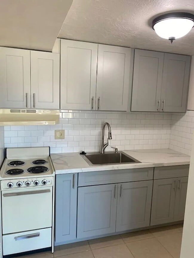High-Floor Studio Featuring Full Kitchen, Parking & Brilliant Views at ...