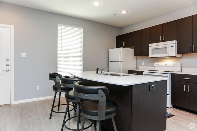 Tri-Gen Construction - University Apartments - 400 S Illinois Ave ...