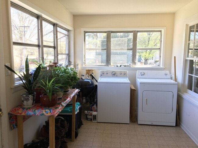 Charming 2-Bedroom, 2-Bath Single-Family Home with Sunroom & Wooded ...